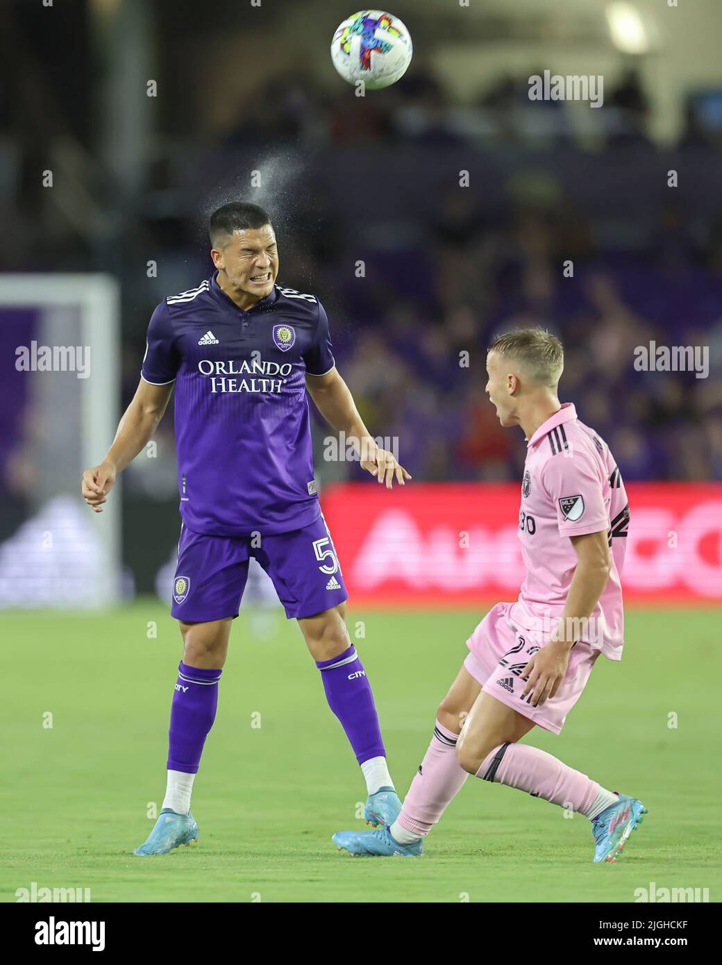 Orlando, FL: Orlando City midfielder César Araújo (5) heads the ball ...
