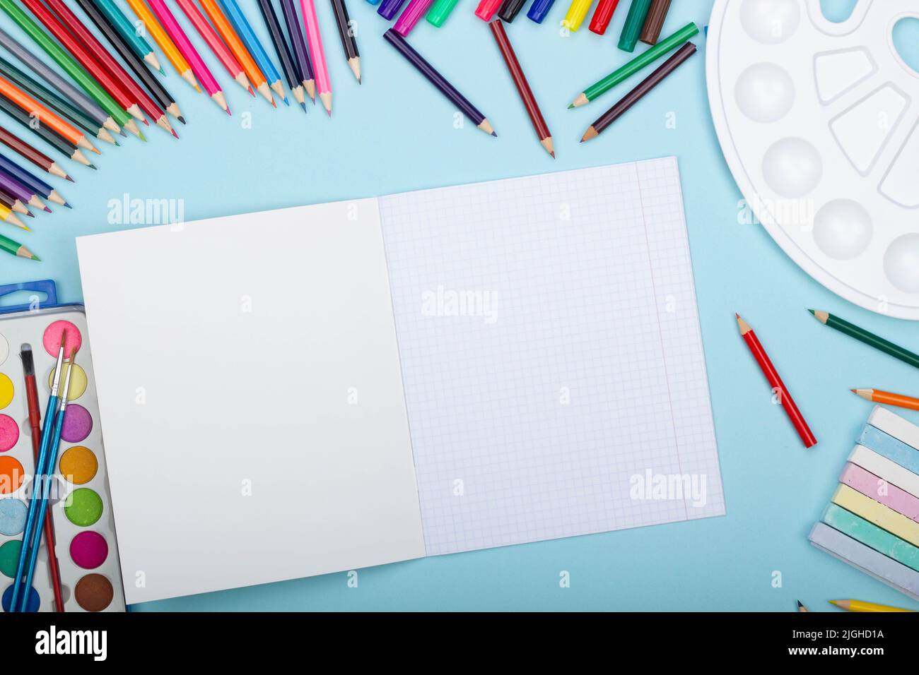 Blank sheet of paper of an open math notebook, art school supplies for ...