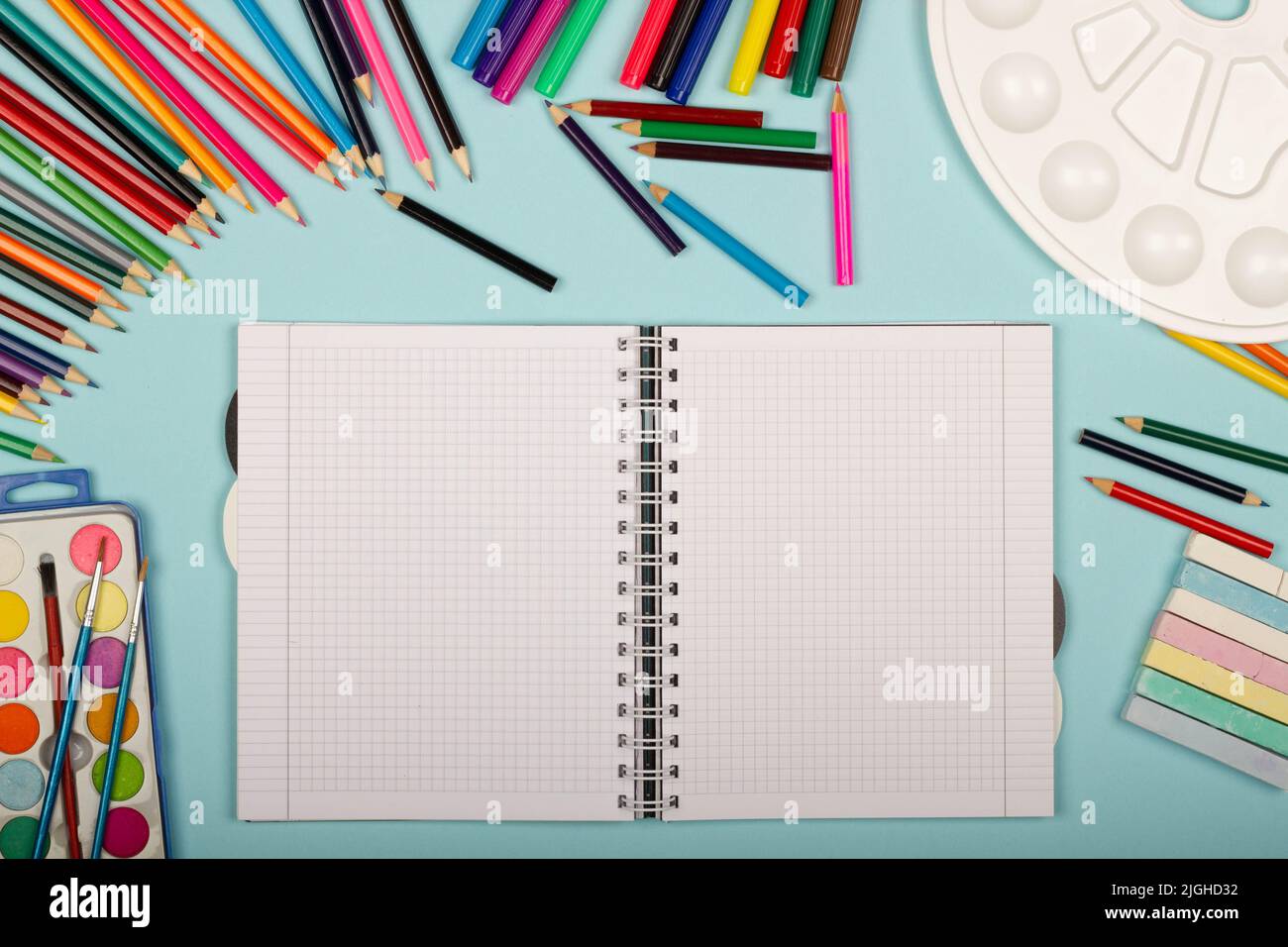 Blank sheet of paper of an open math notebook, art school supplies for ...