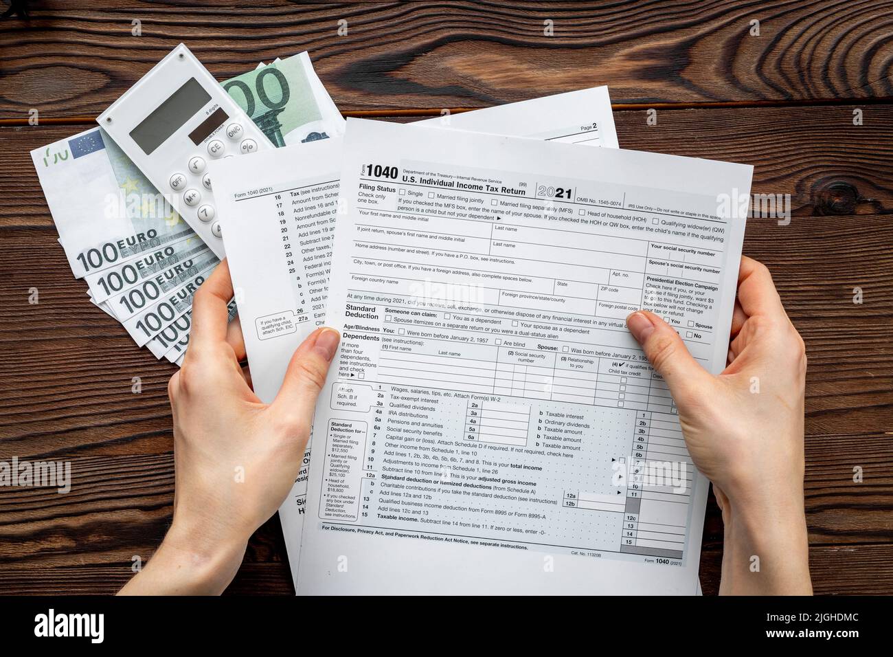 US tax form on office table desktop. Accountant culculate taxes Stock ...