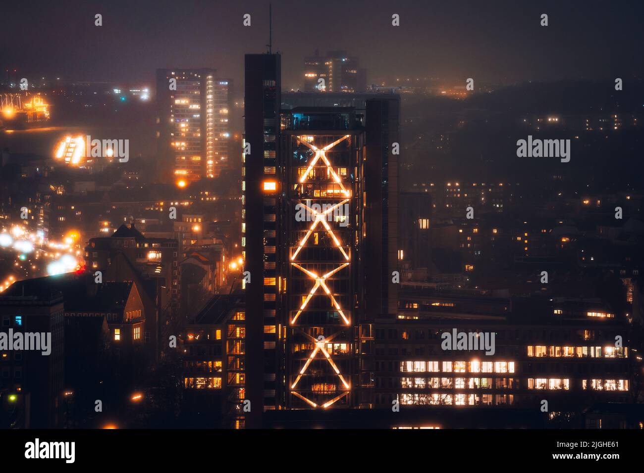 A special Building in a foggy Night with Symbols on the Outside Stock ...