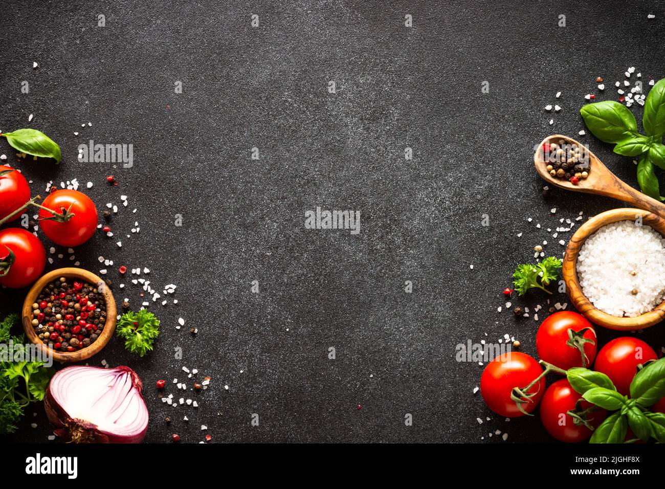 Food cooking background on black stone table Stock Photo - Alamy