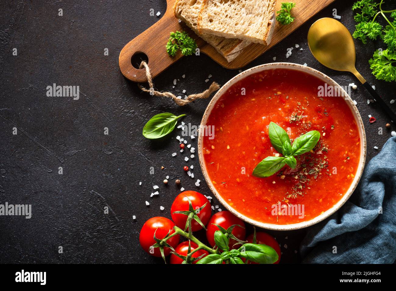 Tomato soup, vegan dish on white Stock Photo - Alamy