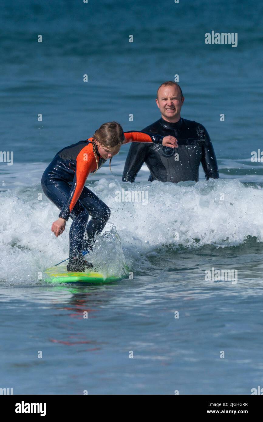Georgina Fletcher aged 10 from St Austell learning to surf as her proud ...