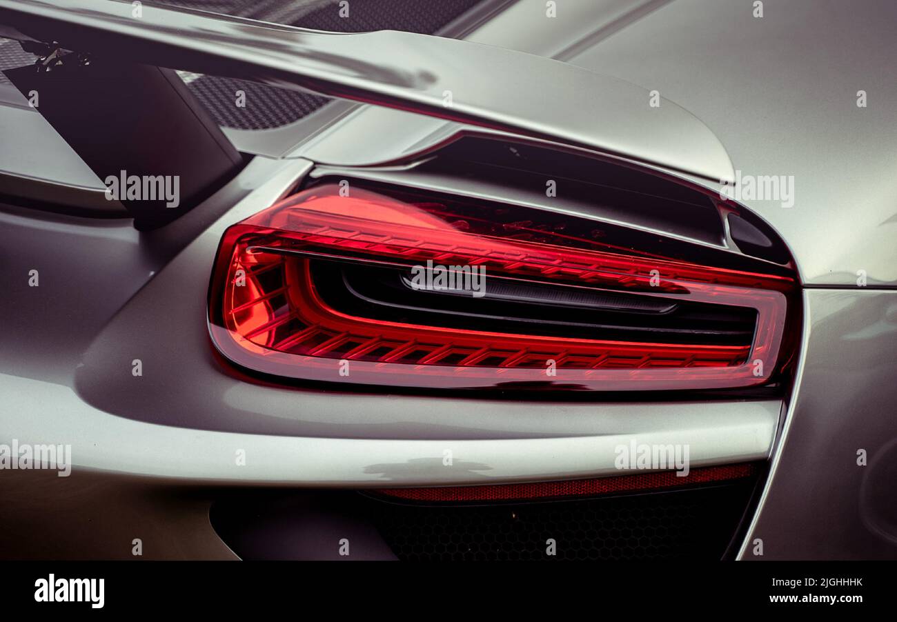 The rear tail light of the luxury silver Porsche 918 Stock Photo - Alamy