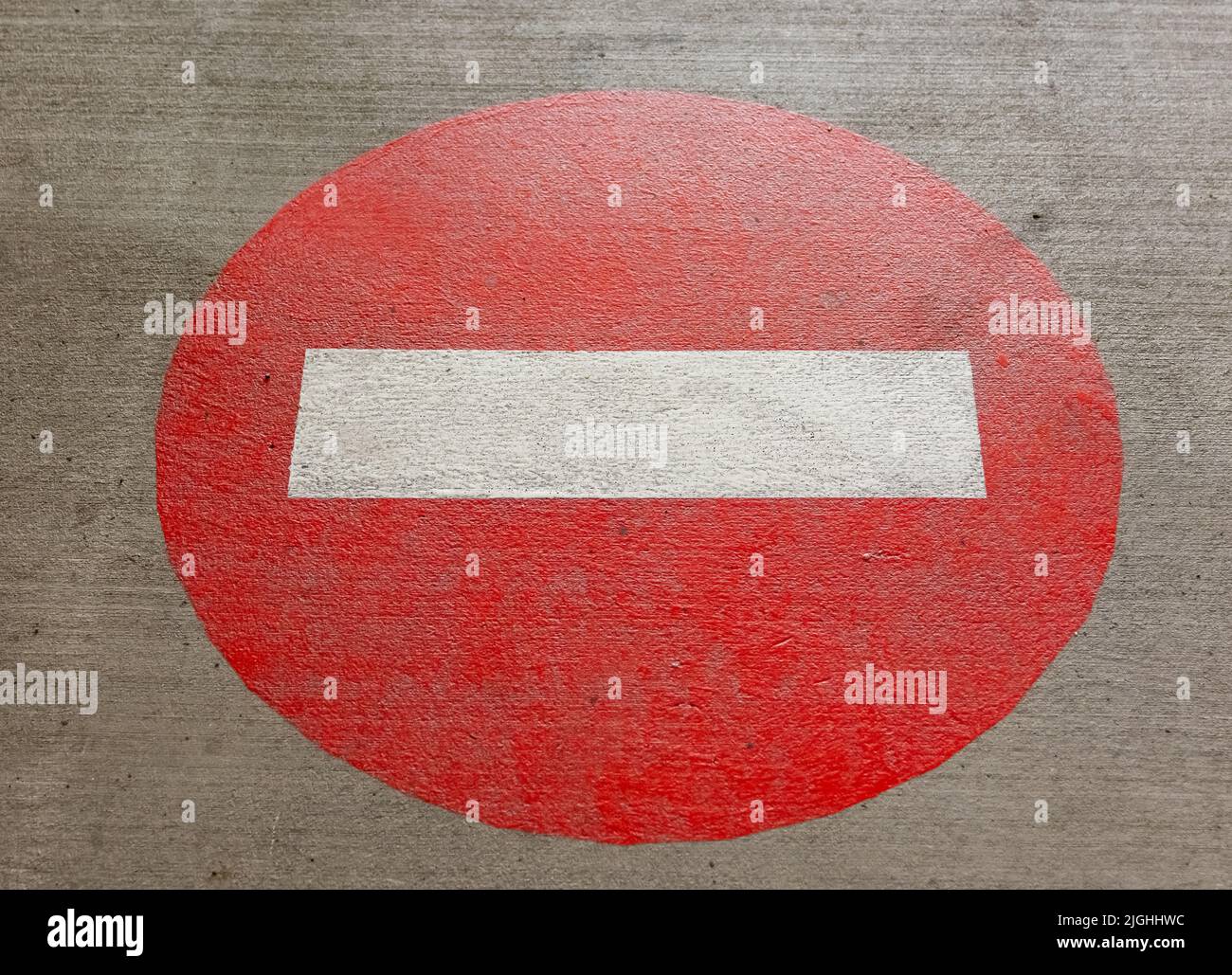road sign entry prohibited on asphalt in the city Stock Photo - Alamy