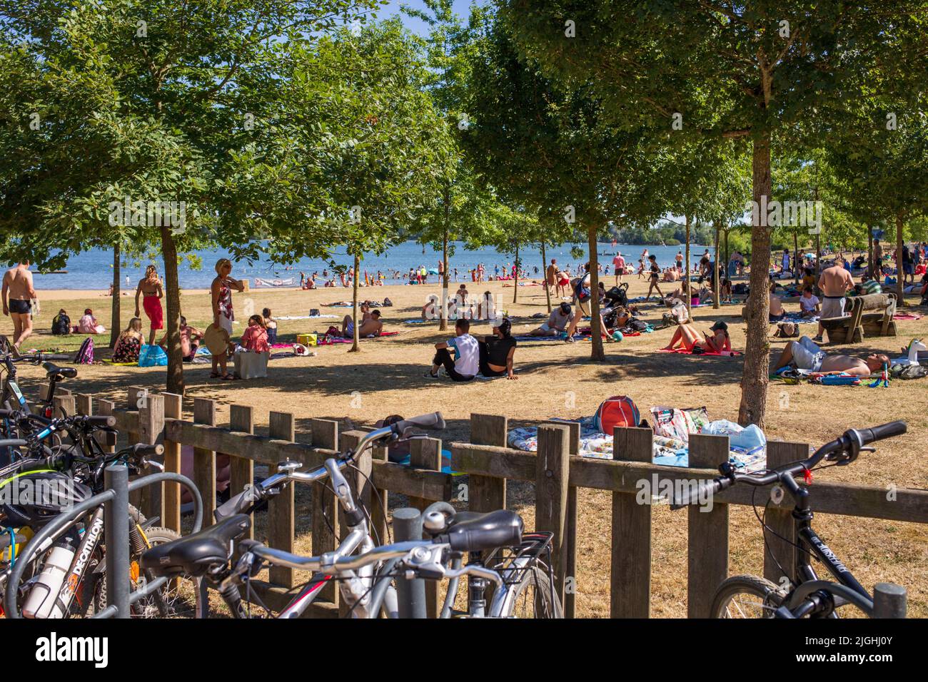 people bathing on public beach, summertime days Stock Photo - Alamy