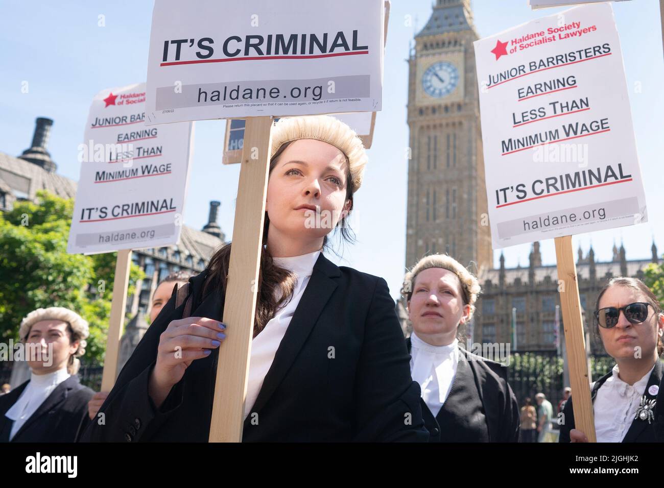 Criminal defence barristers outside the Houses of Parliament in London ...