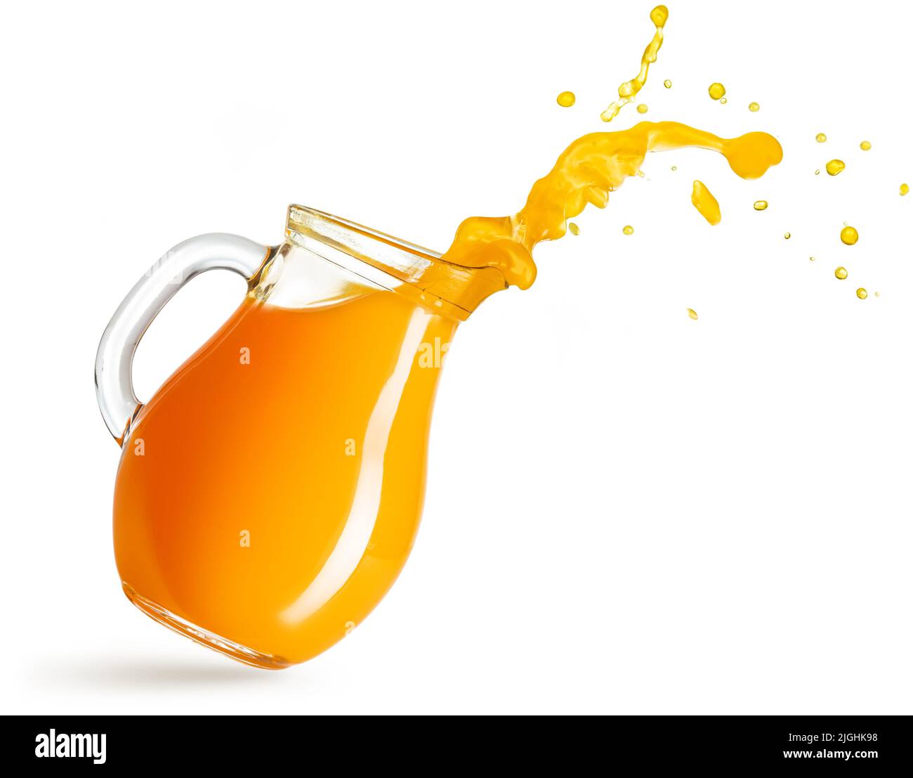 flying pitcher spilling orange juice isolated on white Stock Photo - Alamy