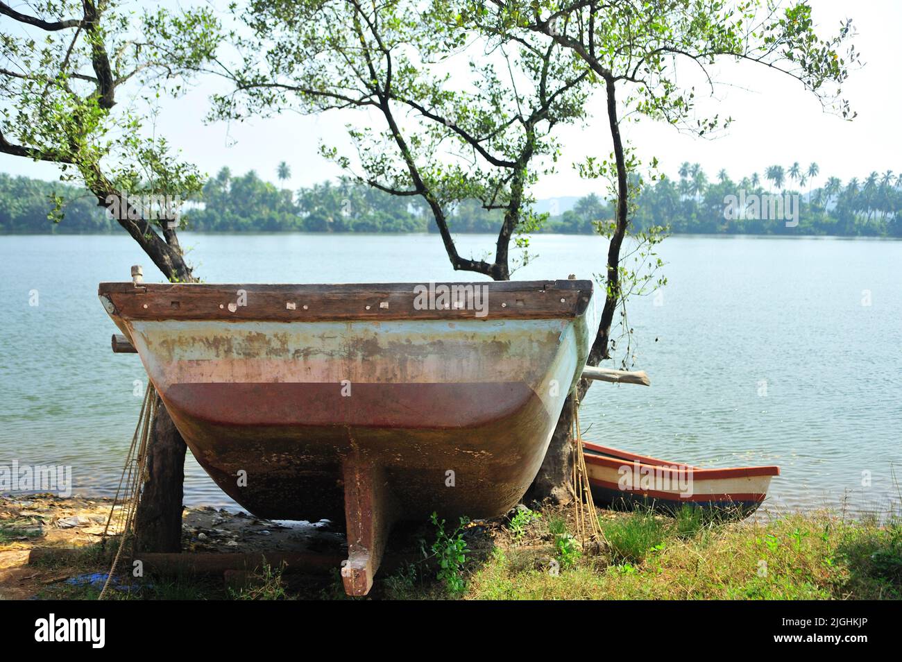 Dilapidated boats parked near creeks shore near village Achara district ...