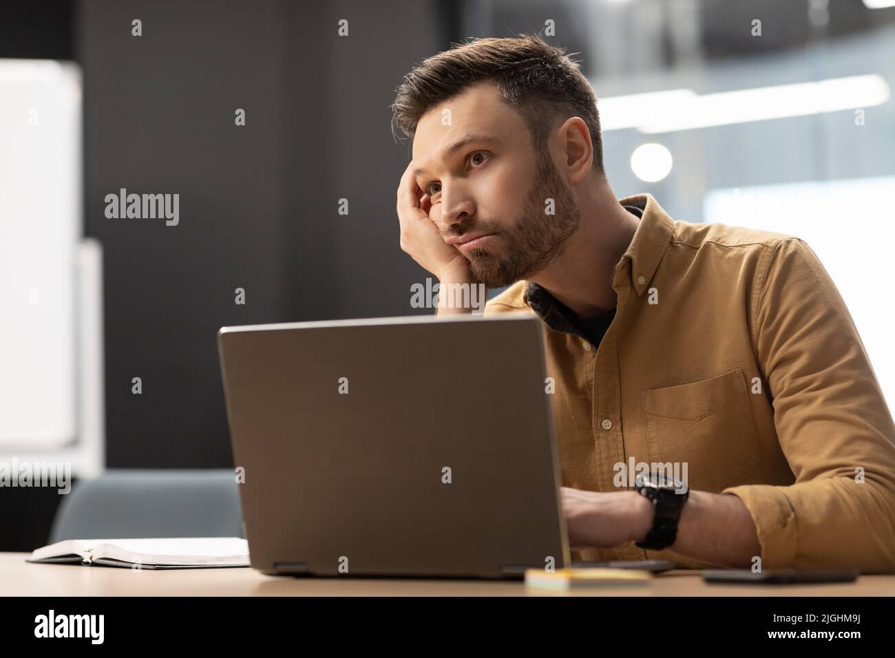 Bored business man sitting office hi-res stock photography and images ...
