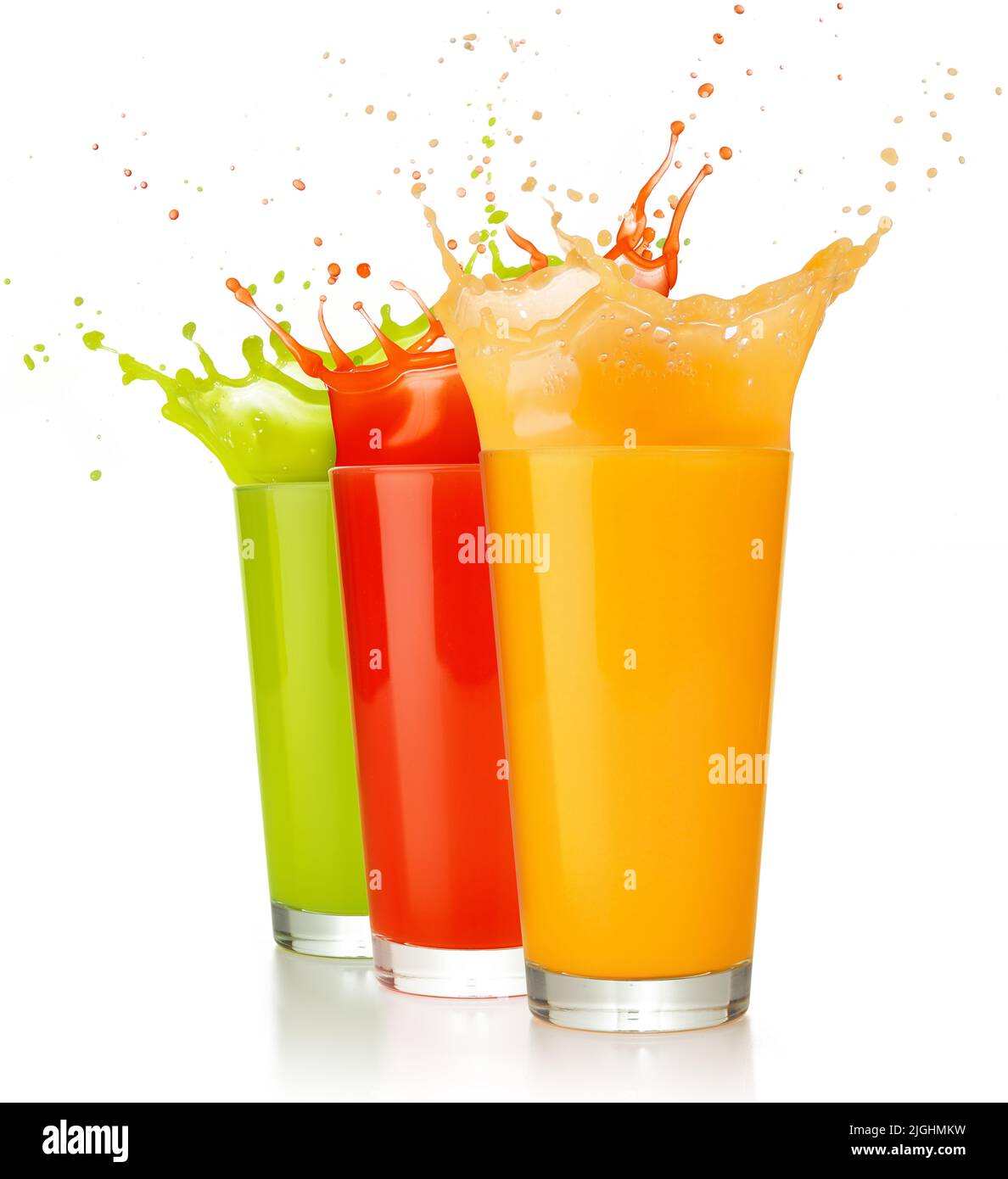 fruit juice glasses splashing isolated on white Stock Photo - Alamy