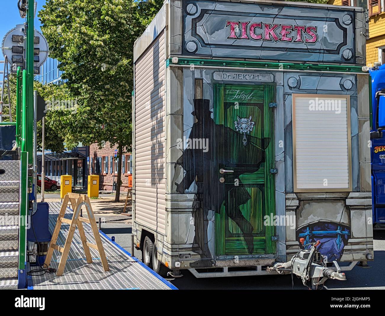 The closed blinds of the ticket booth fairground painted with Dr ...