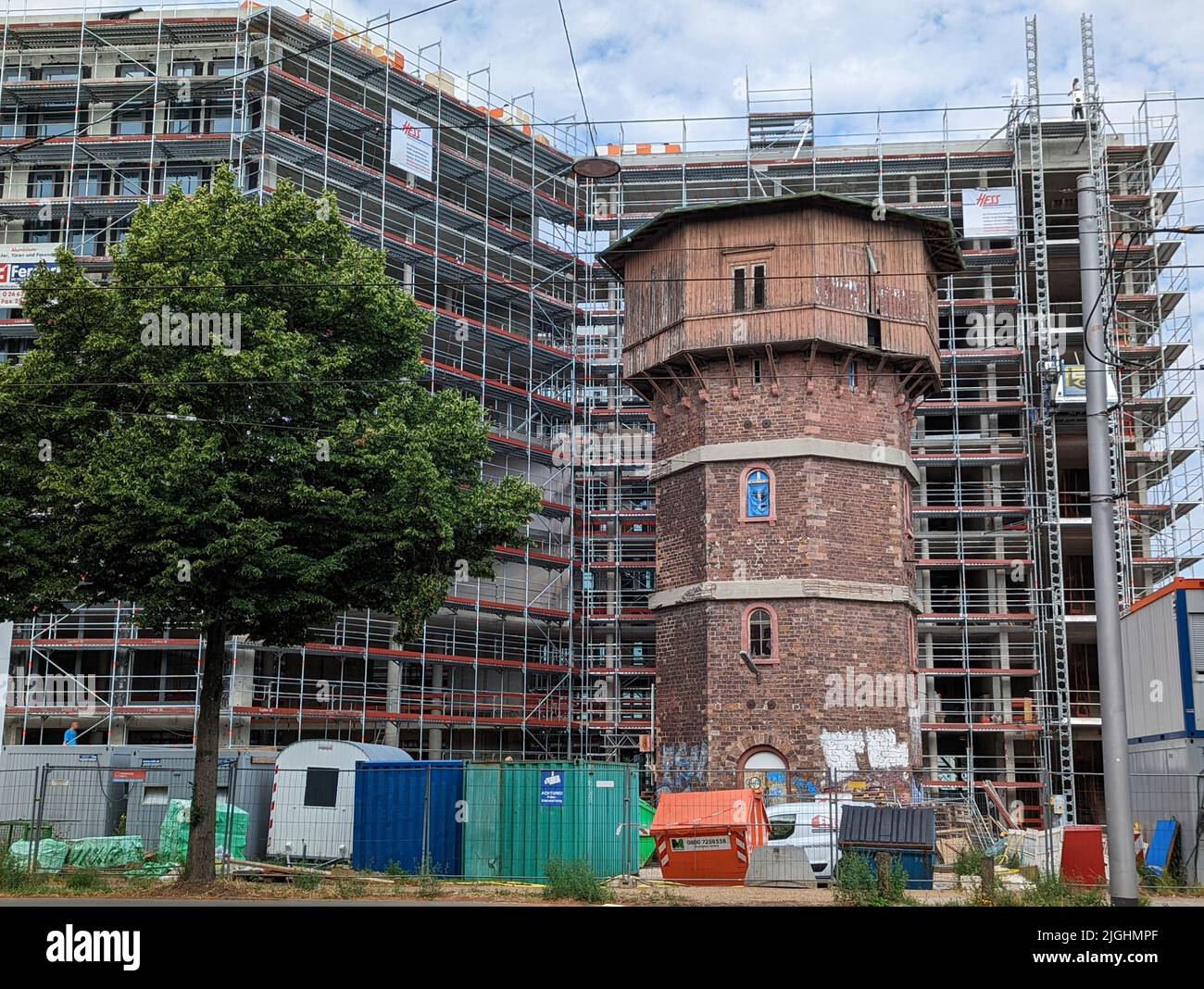 An octagonal water tower in the background of a construction site Stock ...