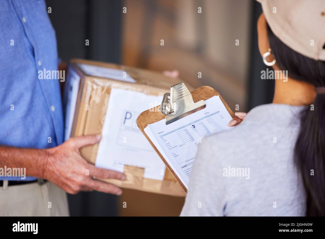 Your package has arrived. High angle shot of an unrecognizable man ...