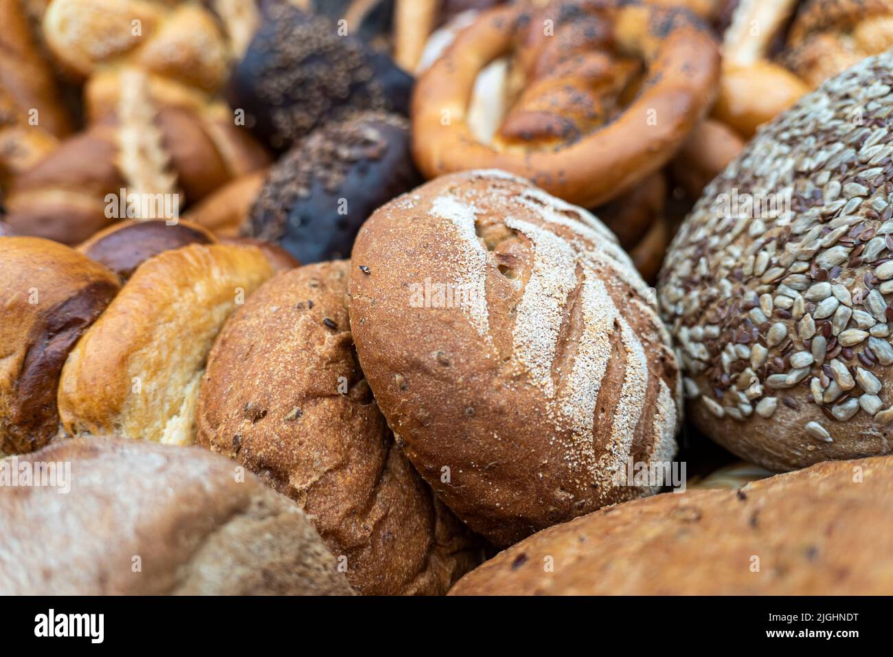 Different kinds of fresh bread as background, bakery food concept Stock ...
