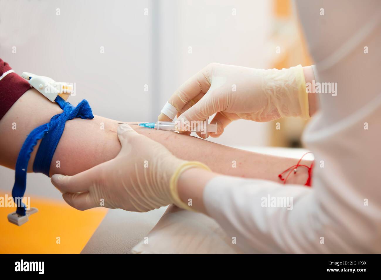 The doctor makes an injection into the patient's vein Stock Photo - Alamy