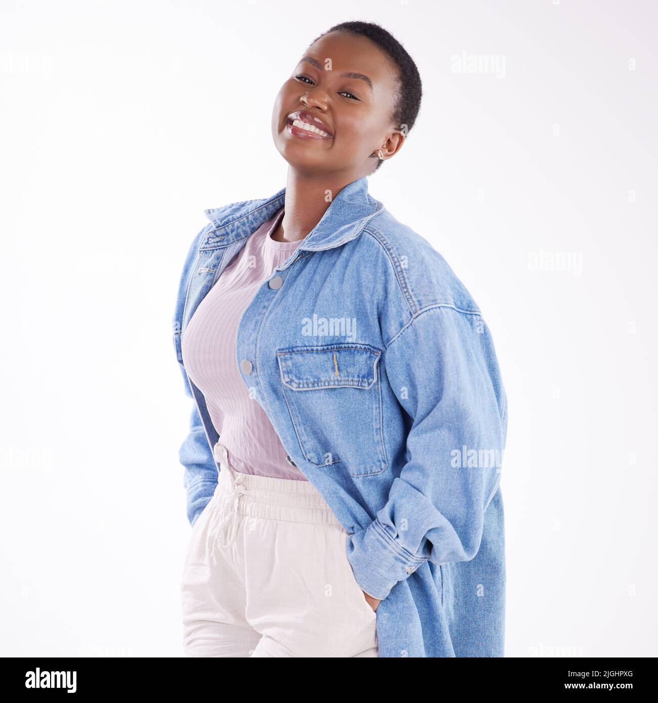 Its a denim jacker kinda day. a beautiful young woman posing against a ...