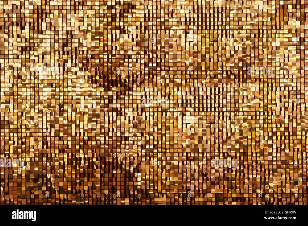 Golden rainbow background from small squares. Iridescent golden glass ...