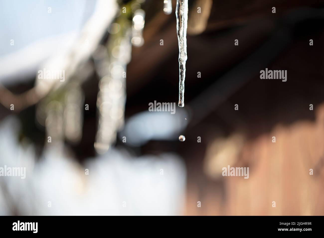 Melt water dripping from roof hi-res stock photography and images - Alamy
