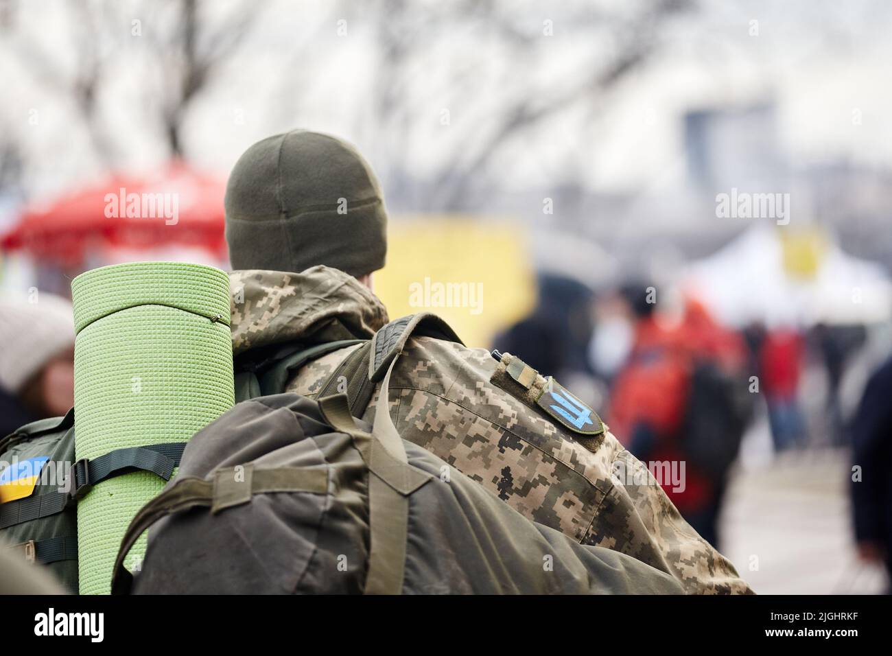 Ukrainian soldier wearing military uniform with flag and chevron ...