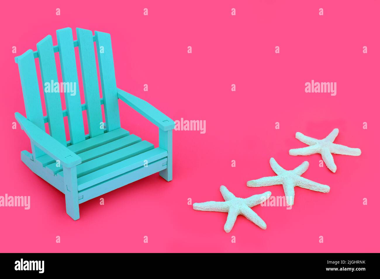 Relaxing trendy blue chair furniture with starfish sea shells on vivid ...