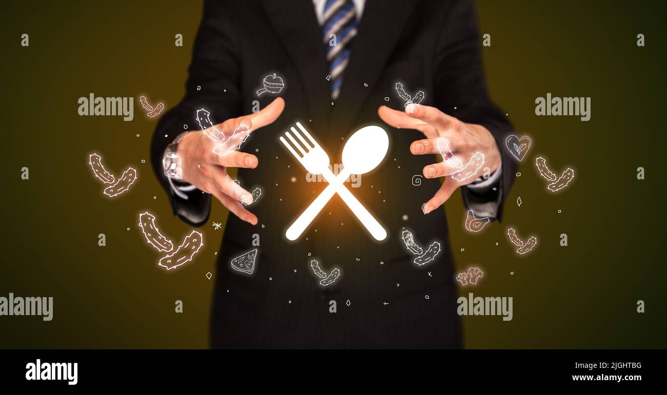 Hand holding food related icons Stock Photo - Alamy