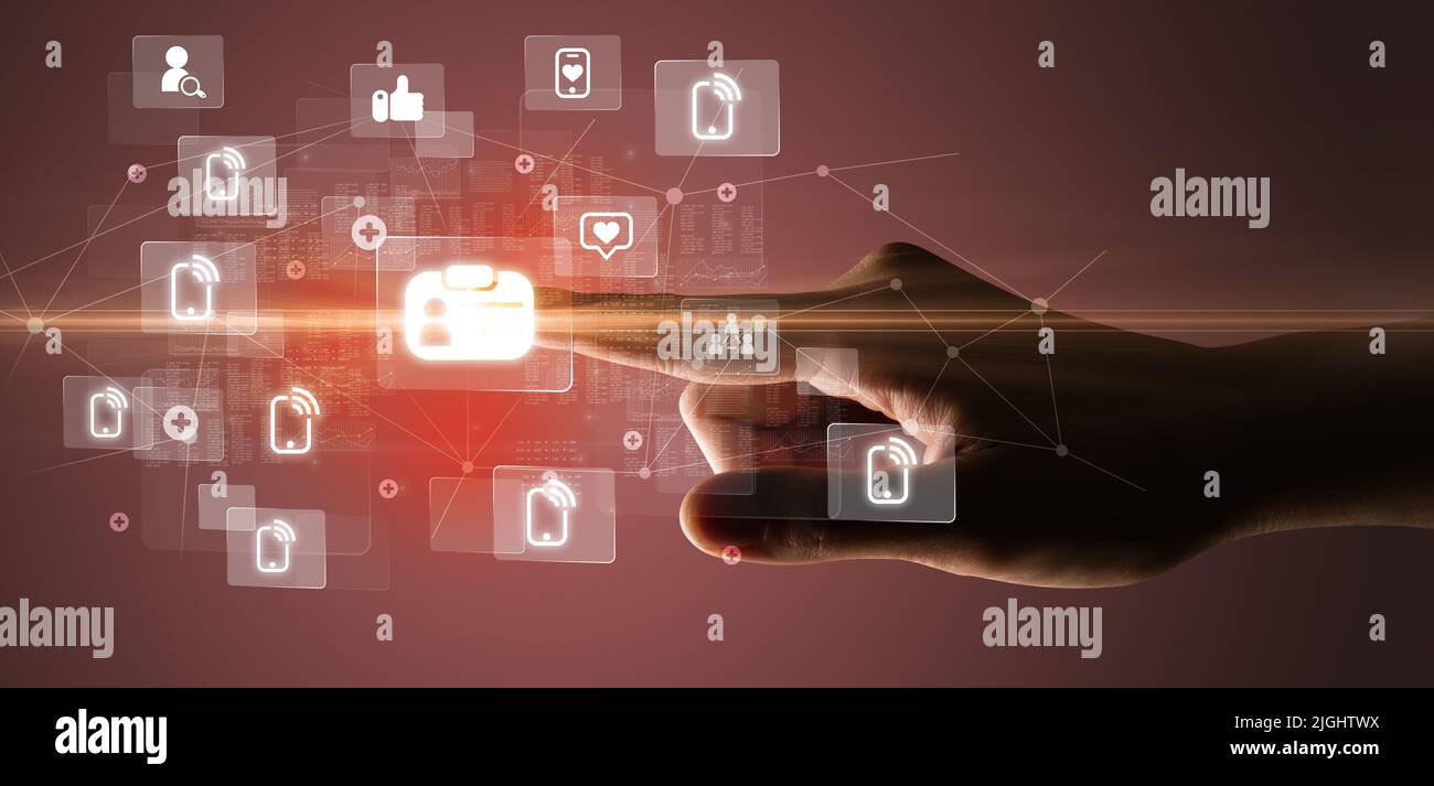 Hand pressing social media multimedia application screen with media ...