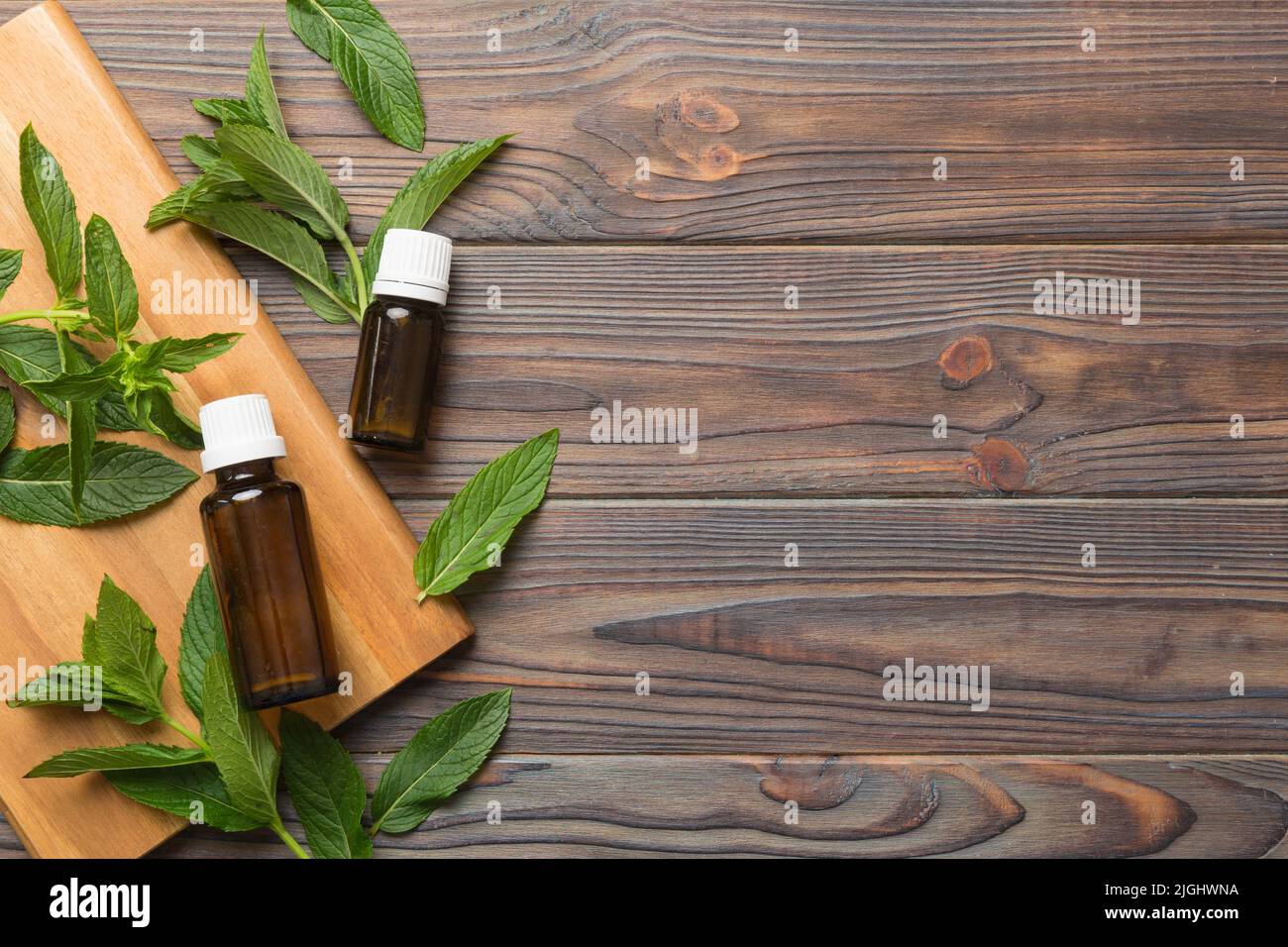 Natural Mint Essential Oil in a Glass Bottle. organic cosmetics with ...