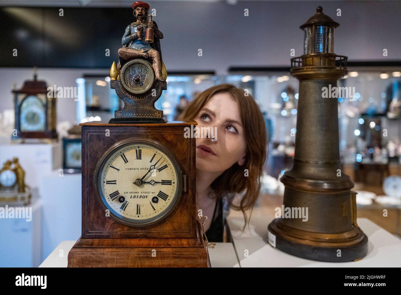 Automata clock hi-res stock photography and images - Alamy