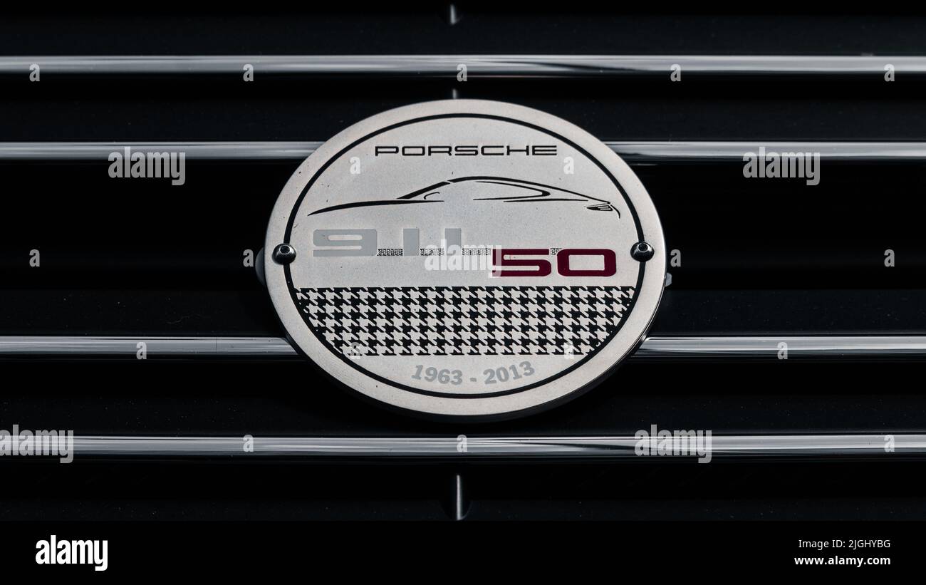 A closeup of a 50 Years Badge on a Porsche 911 Stock Photo - Alamy