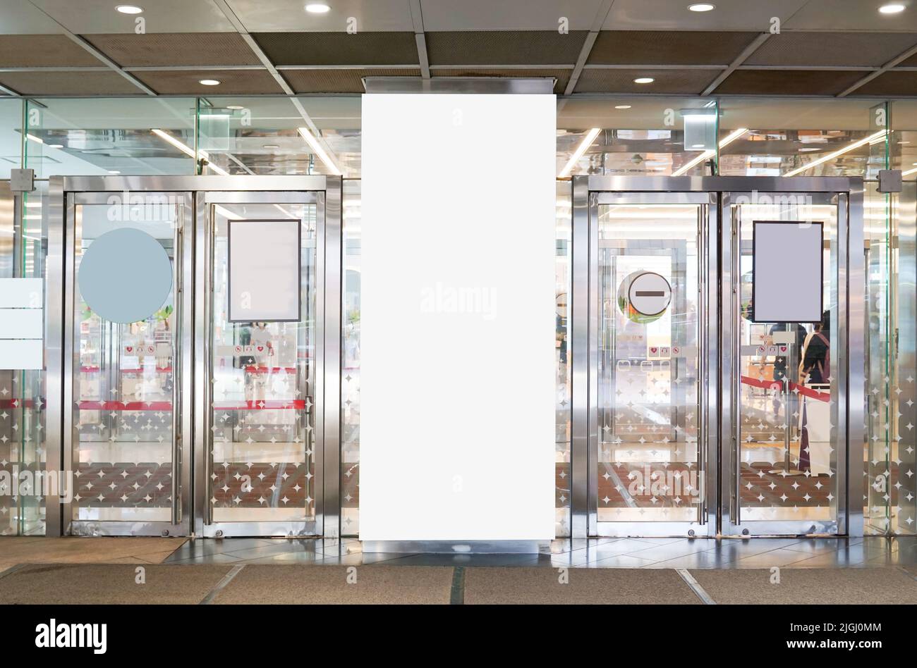 Advertising poster board outside department store Stock Photo - Alamy