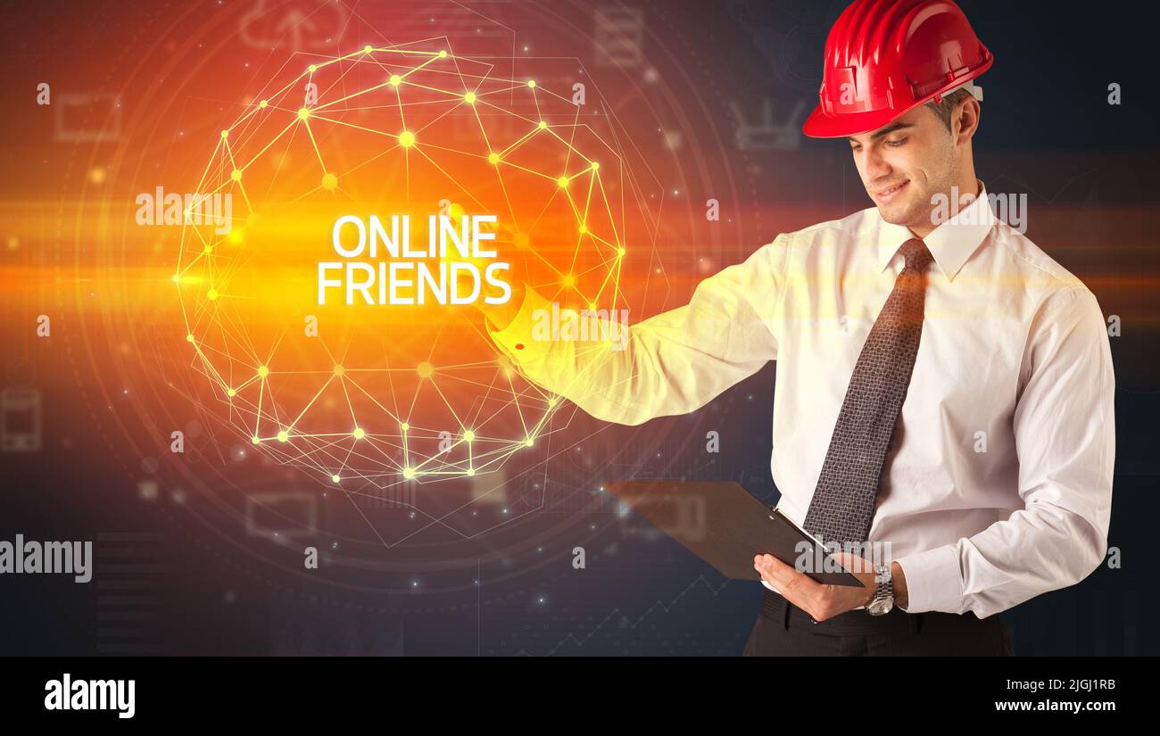 Handsome businessman with helmet drawing Stock Photo - Alamy