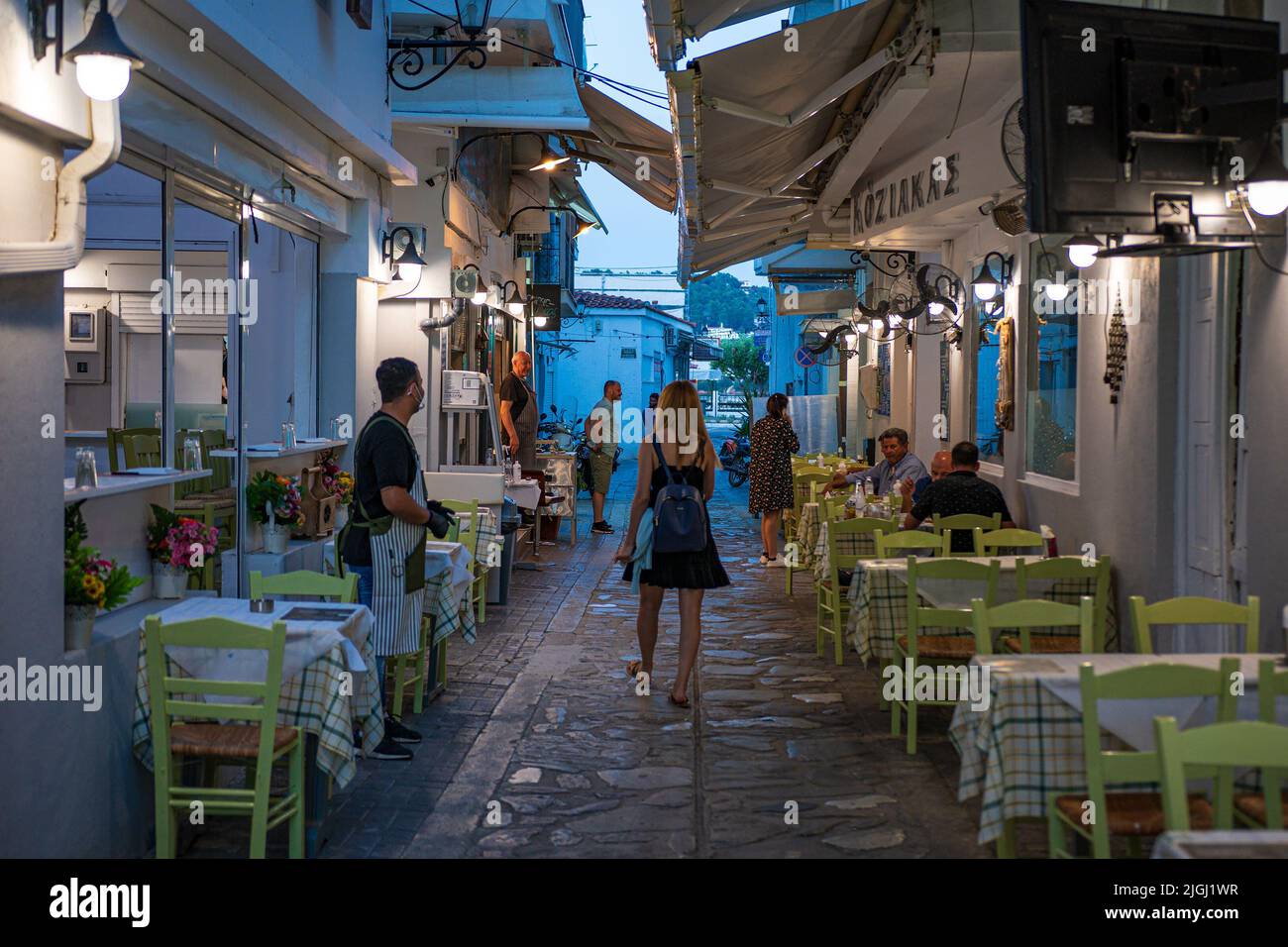 Urban view of the beautiful city center of Chora town in Skiathos ...