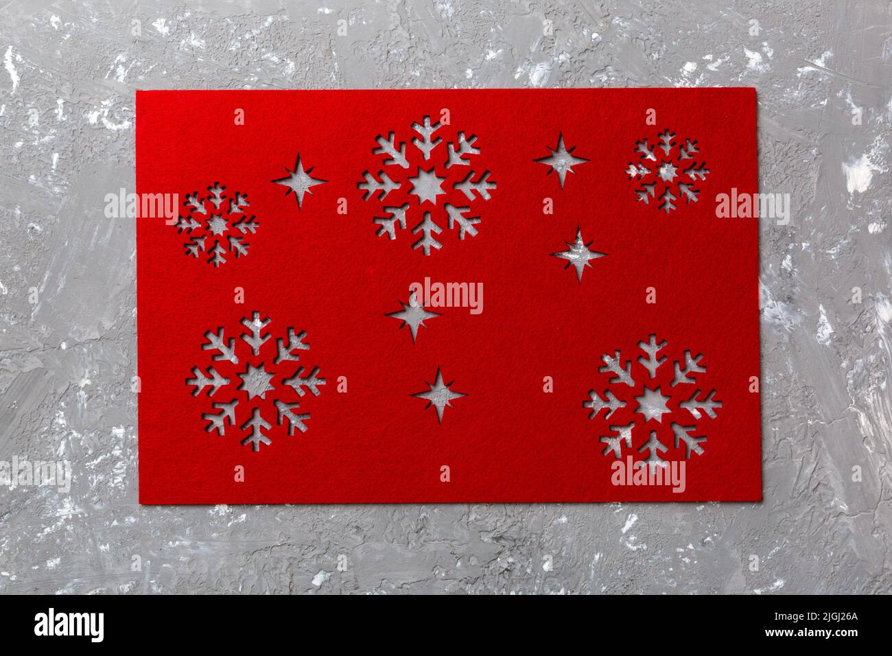 Top view of red tablecloth for food on cement background. Empty space ...