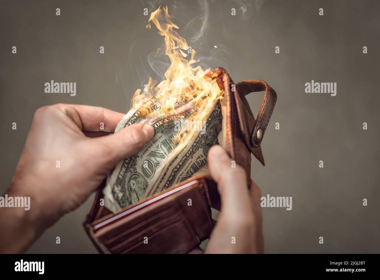 Burning dollar bill hi-res stock photography and images - Alamy