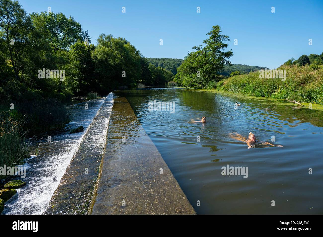 People cool off in the river Avon at Warleigh Weir near Bath in ...