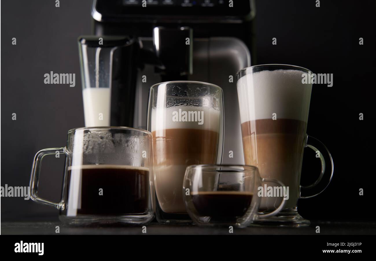 Group of cup with different freshly types of coffee: cappuccino, latte ...