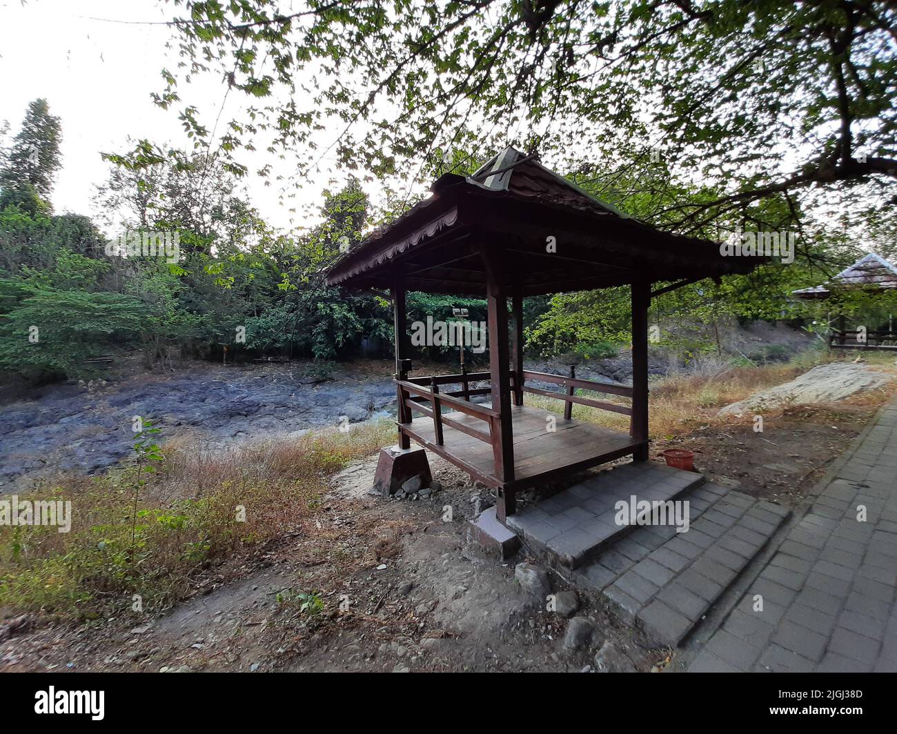 A gazebo sitting place at a recreation place at a river in Yogyakarta ...