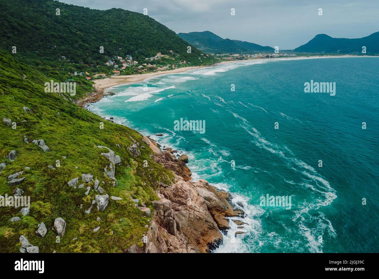 Scenic coastline with mountains and blue ocean with waves in Brasil ...