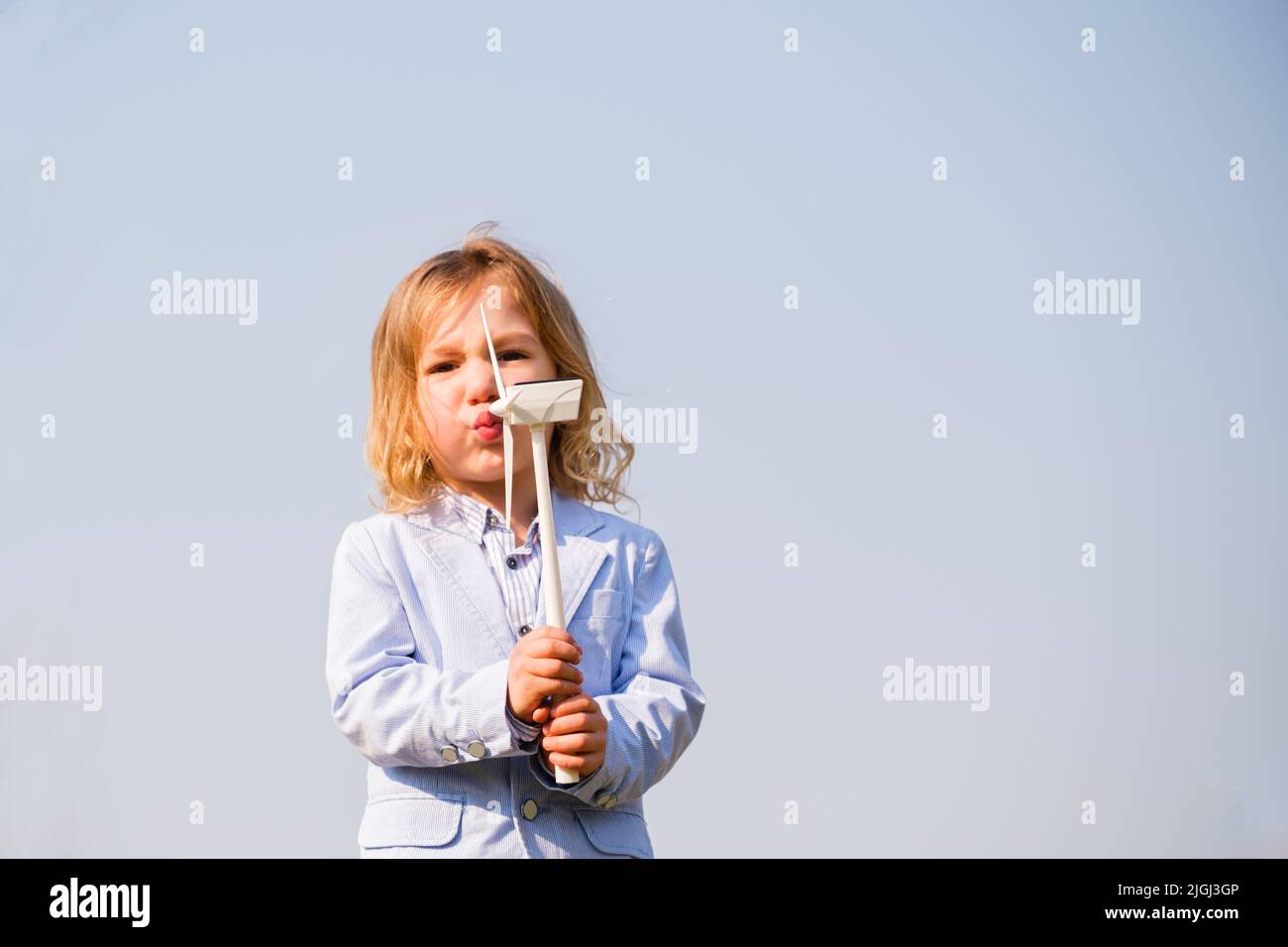 Boy wind blowing hi-res stock photography and images - Alamy