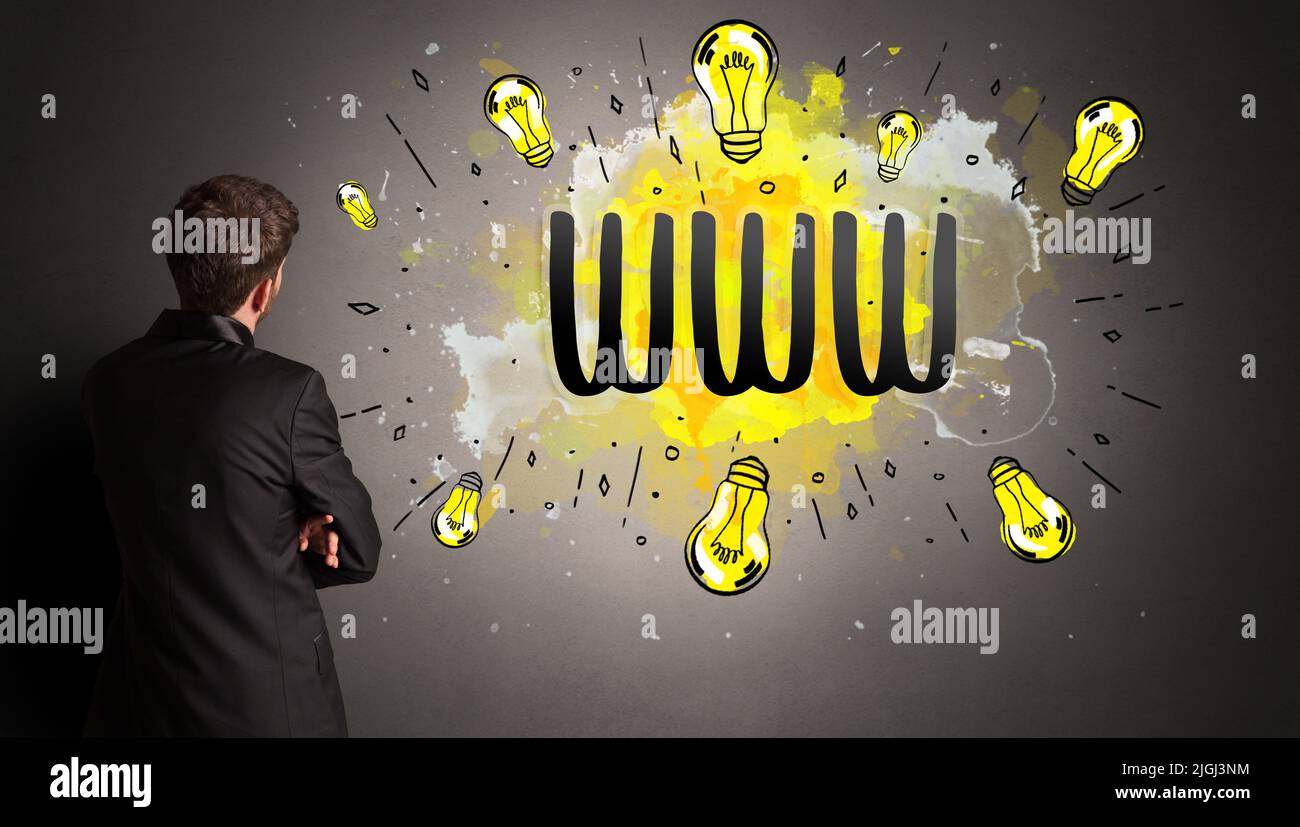man drawing colorful light bulb Stock Photo - Alamy