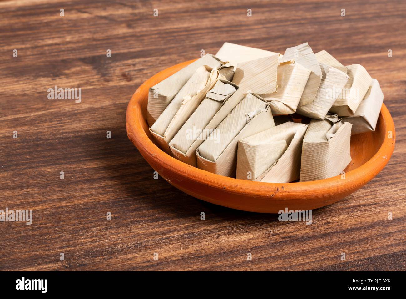 Guava Paste Wrapped in Bijao Leaf; Photo On Wood Background Stock Photo ...