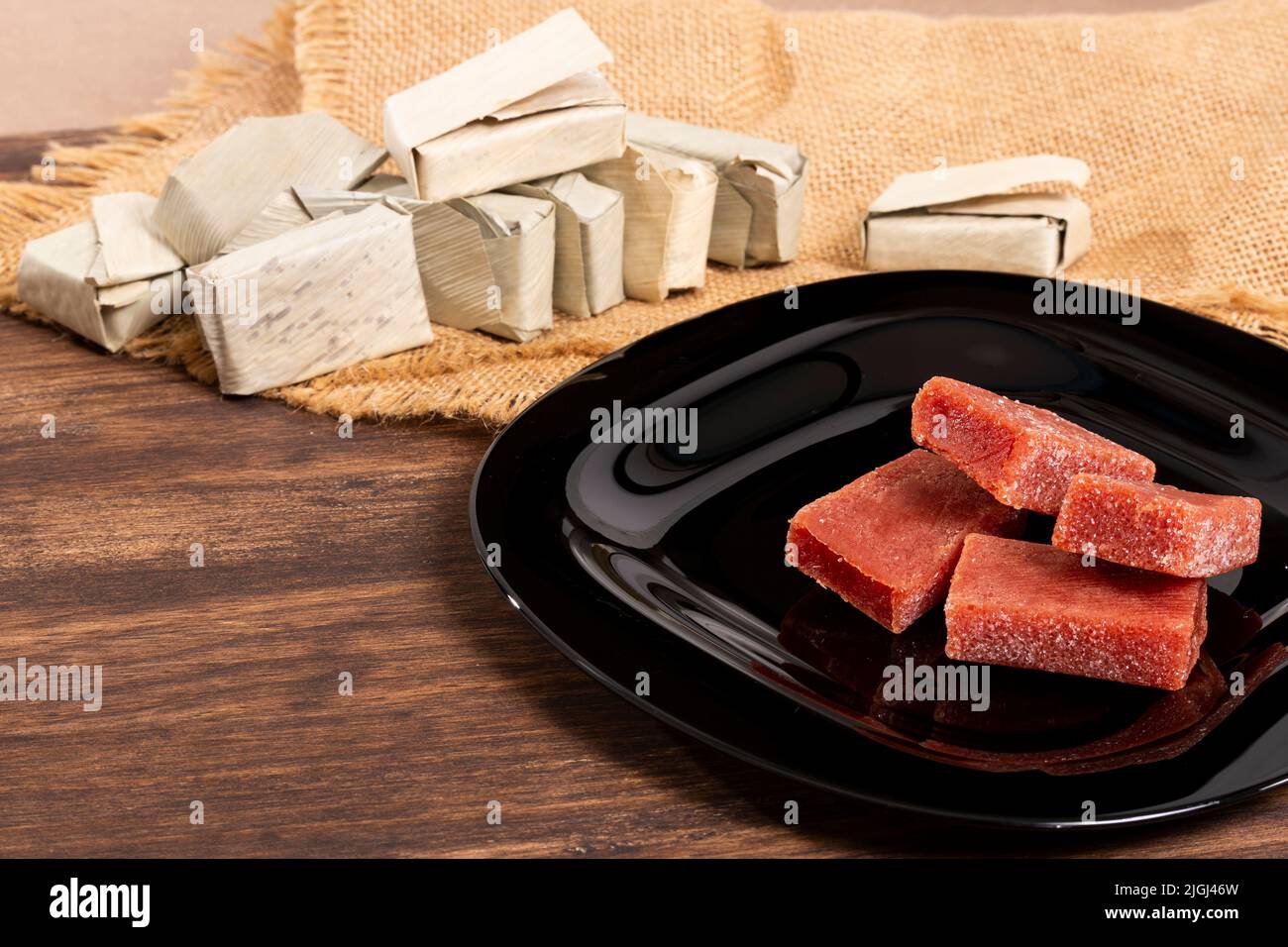 Guava Paste Wrapped in Bijao Leaf; Photo On Wood Background Stock Photo ...