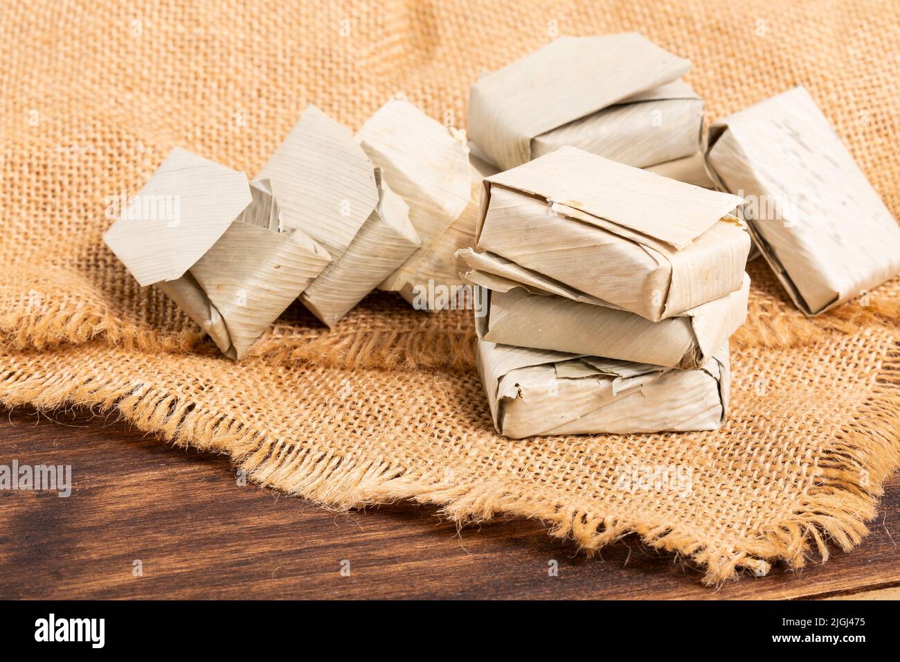 Guava Paste Wrapped in Bijao Leaf; Photo On Wood Background Stock Photo ...