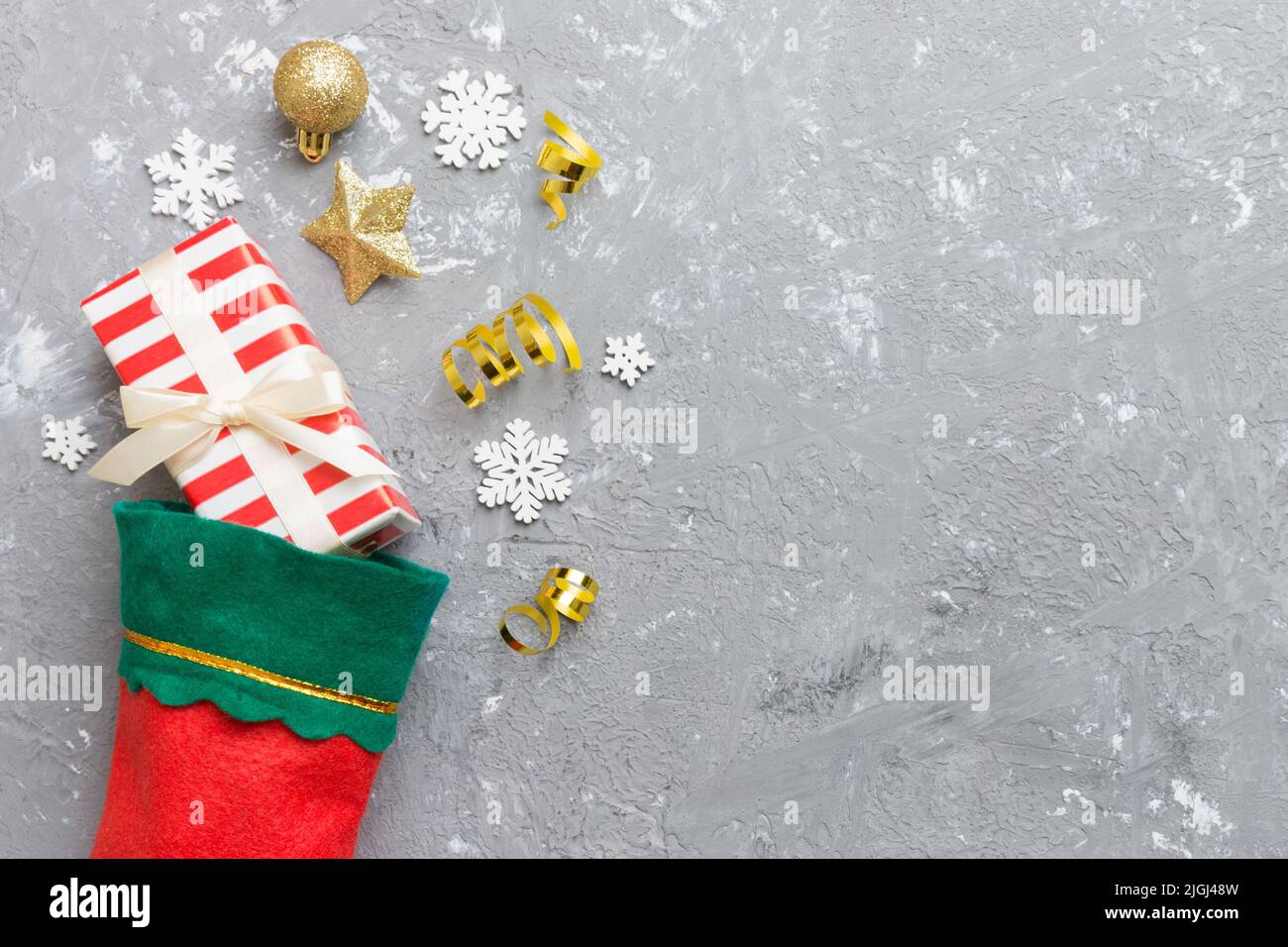 santa red sock top view on the color background with empty space ...