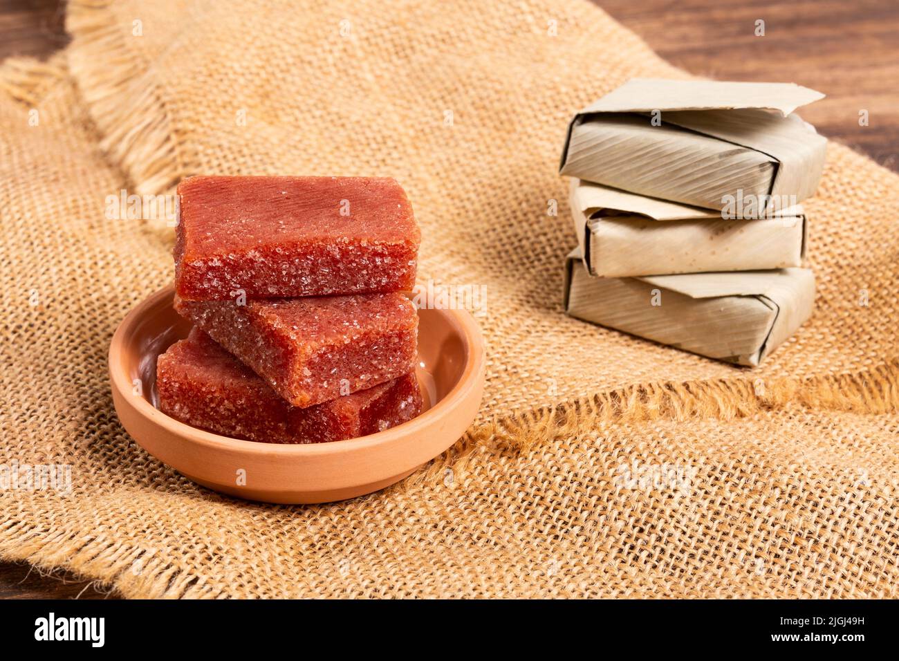 Guava Paste Wrapped in Bijao Leaf; Photo On Wood Background Stock Photo ...