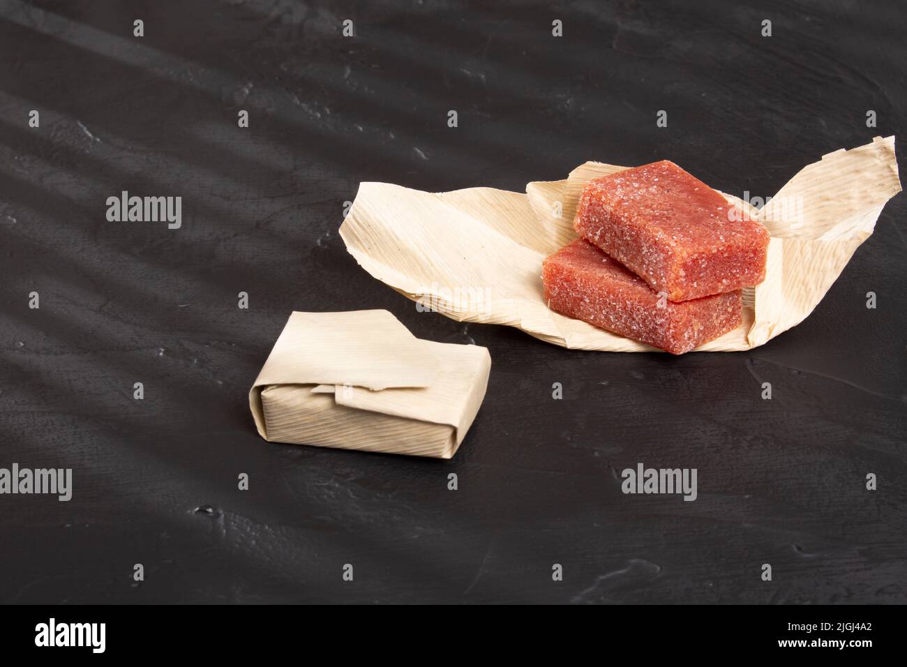 Guava Paste Wrapped in Bijao Leaf; Photo On Black Background Stock ...