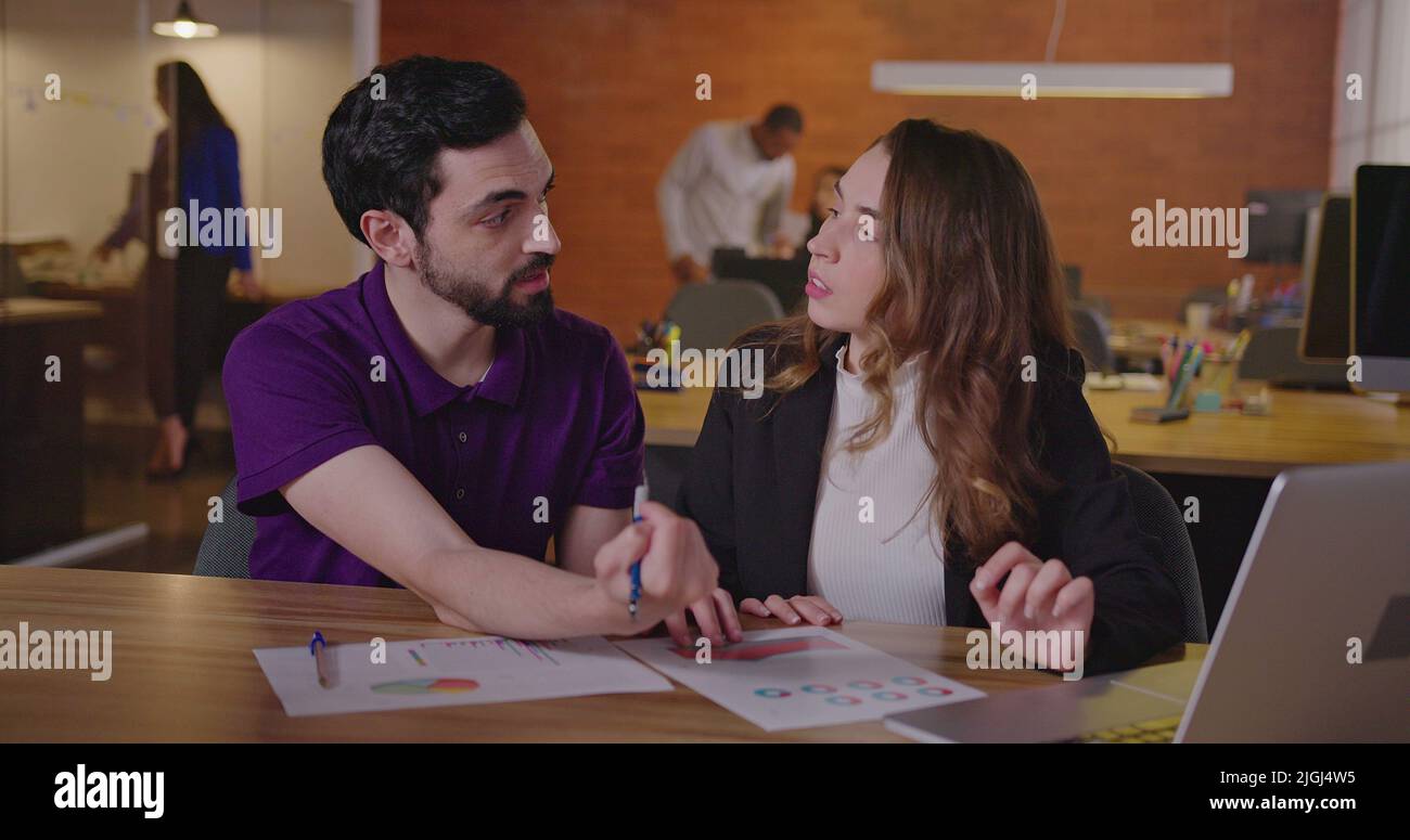 Female staff coaching new male employee at new job. First day work concept Stock Photo - Alamy