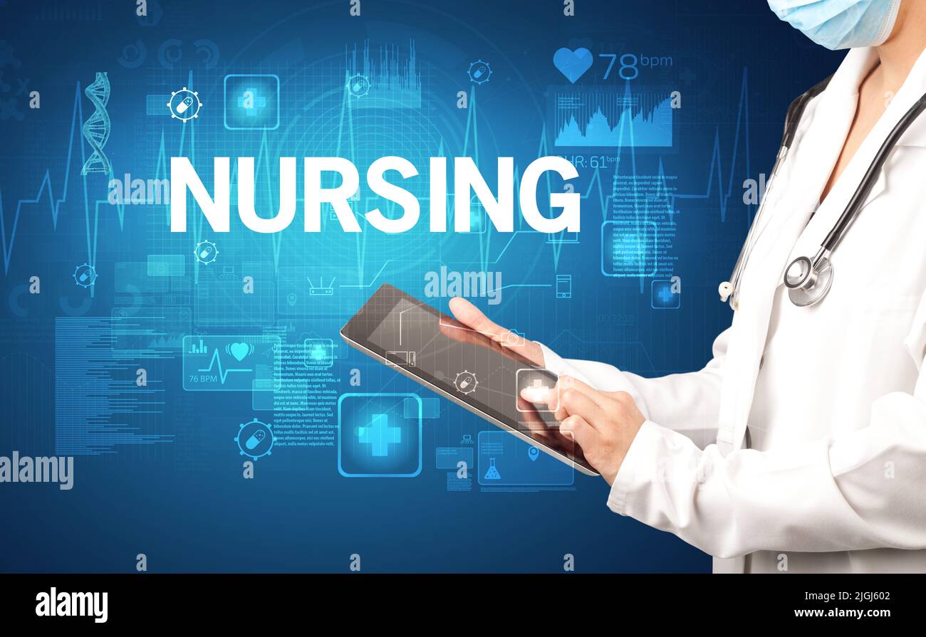 young doctor writing down notes Stock Photo - Alamy